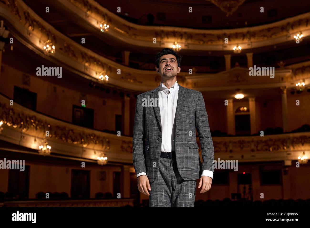 Showman. Young male entertainer, presenter or actor on stage. male ...