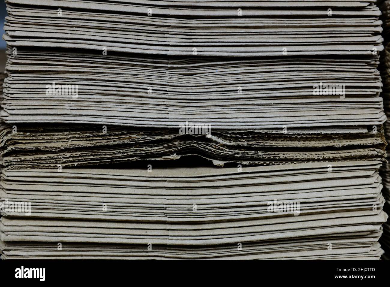 Closeup of a stack of the old cardboards - wallpaper Stock Photo - Alamy