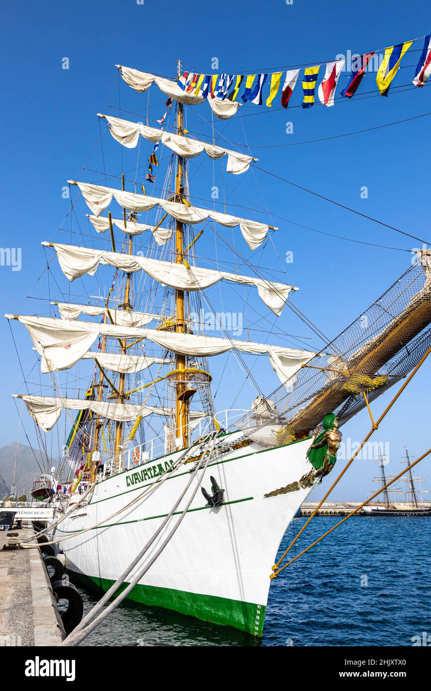 View of a white tall ship with different flags in the harbor Stock ...