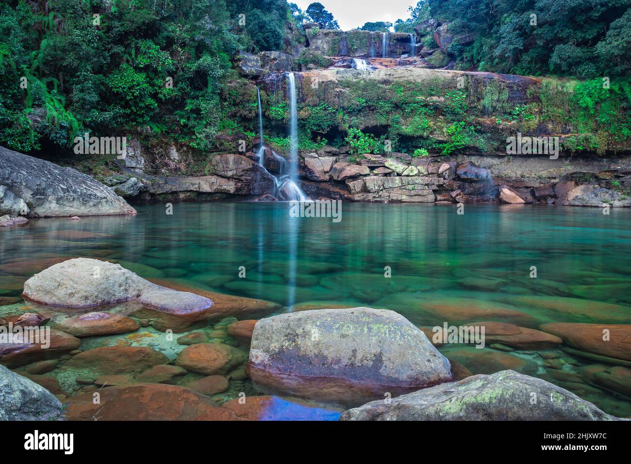 natural waterfall clear view with water stream falling from mountain at ...
