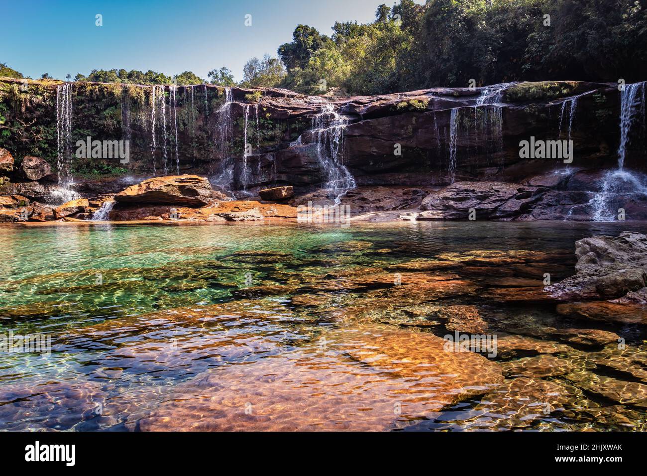 natural waterfall white water streams with calm clear water at morning ...