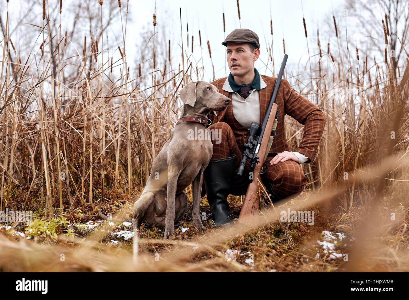 Young hunter hunt on ducks and wild animals in autumn, in nature ...