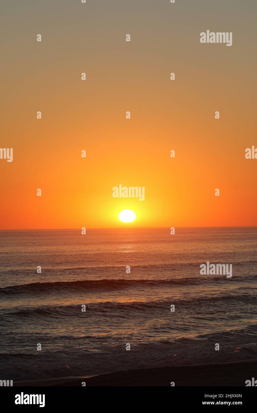 Sunset over the ocean, Henties Bay, Namibia Stock Photo - Alamy