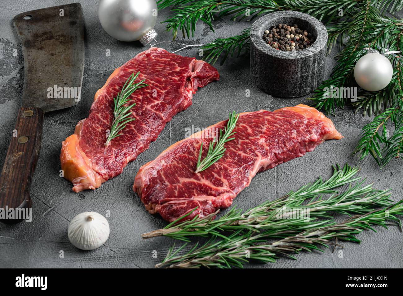 Raw meat steaks set, on gray stone table background Stock Photo - Alamy