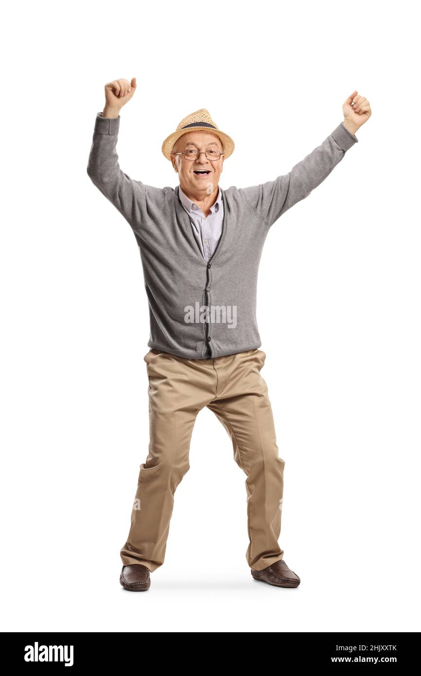 Full length portrait of a happy elderly man dancing with arms up ...