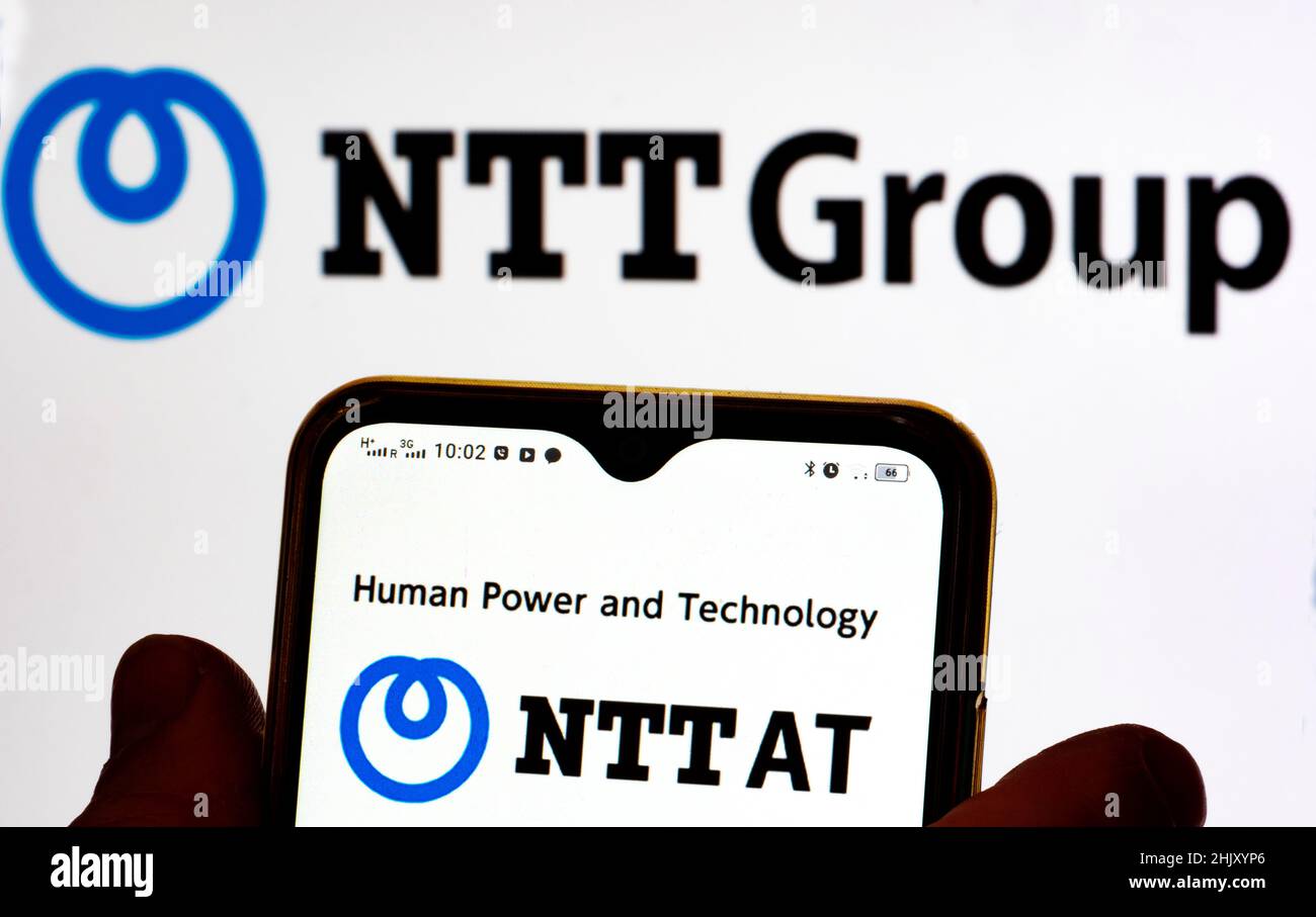 In this photo illustration, the NTT AT logo is displayed on a ...