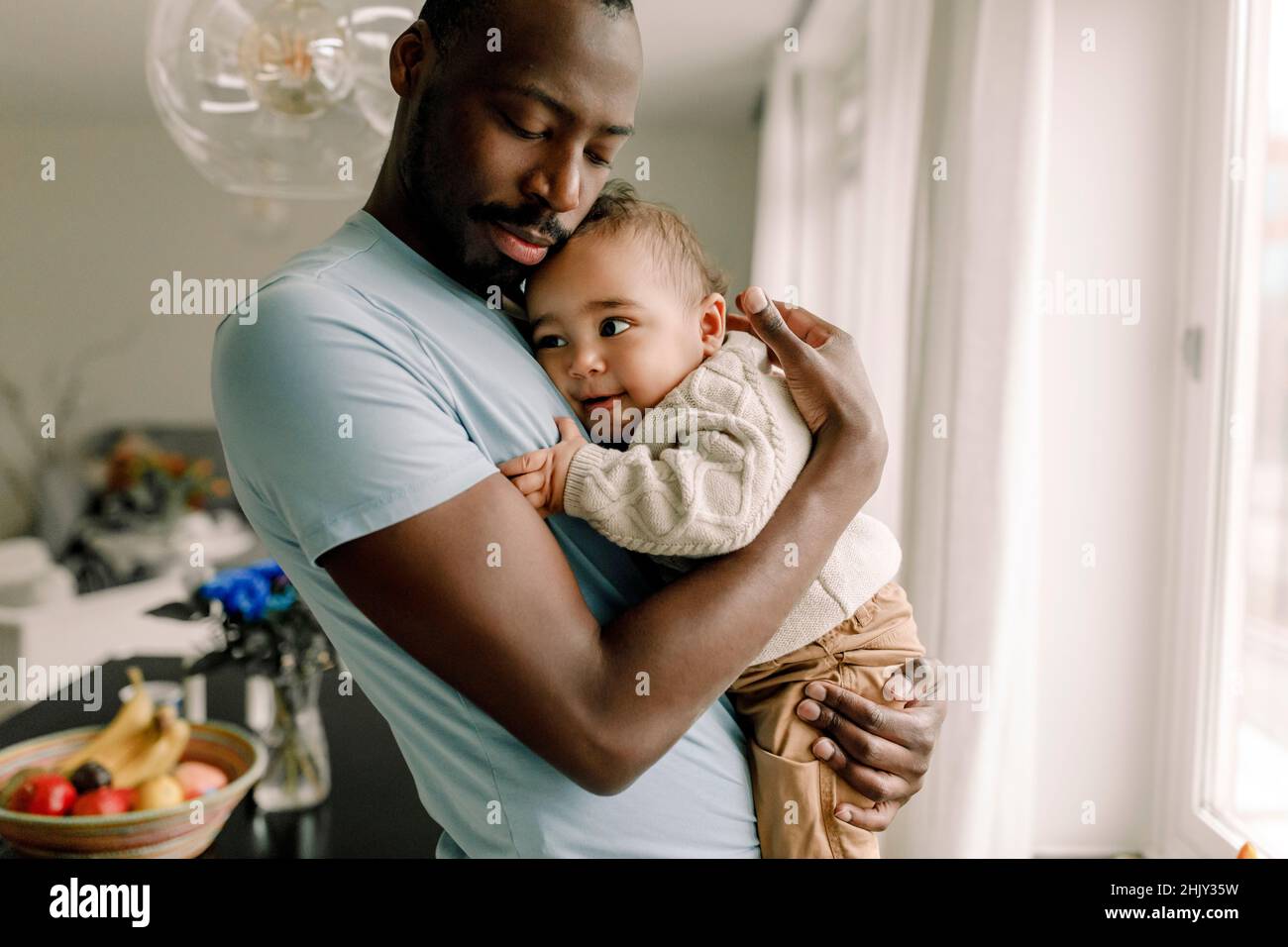 African carrying baby boy on hi-res stock photography and images - Alamy