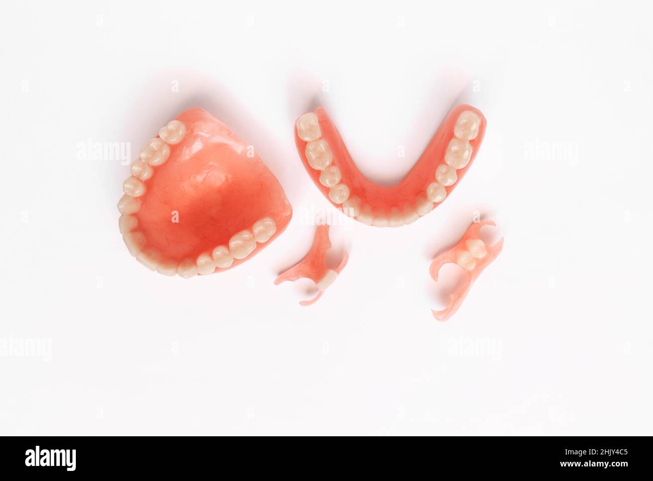 Dentures on a white background. Close-up of dentures. Dentistry is ...