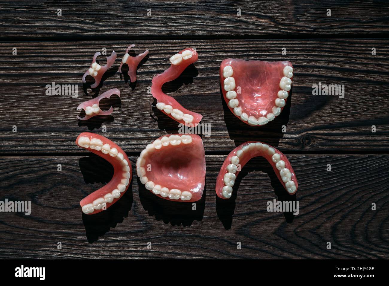 Dentures on a dark background. Close-up of dentures. Dentistry is ...