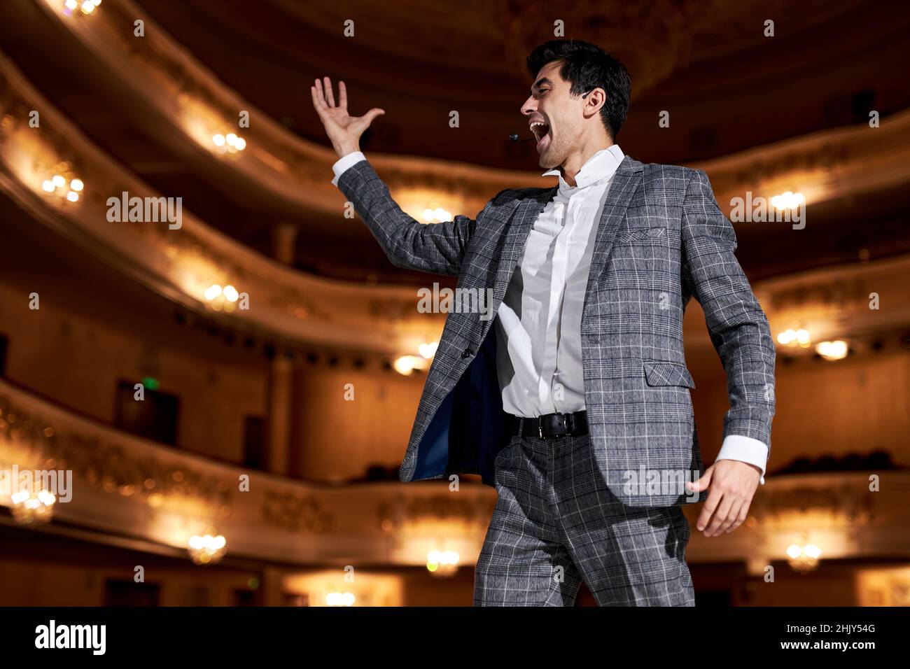 professional opera singer in elegant classic outfit, singing hit with ...