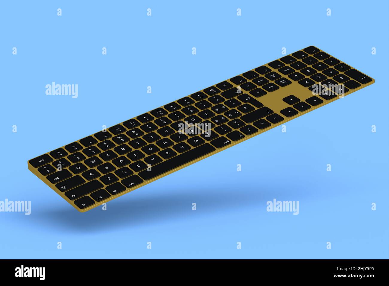 Modern gold aluminum computer keyboard isolated on blue background ...