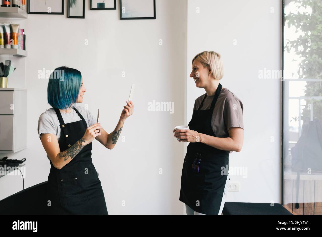 Running a salon hi-res stock photography and images - Alamy