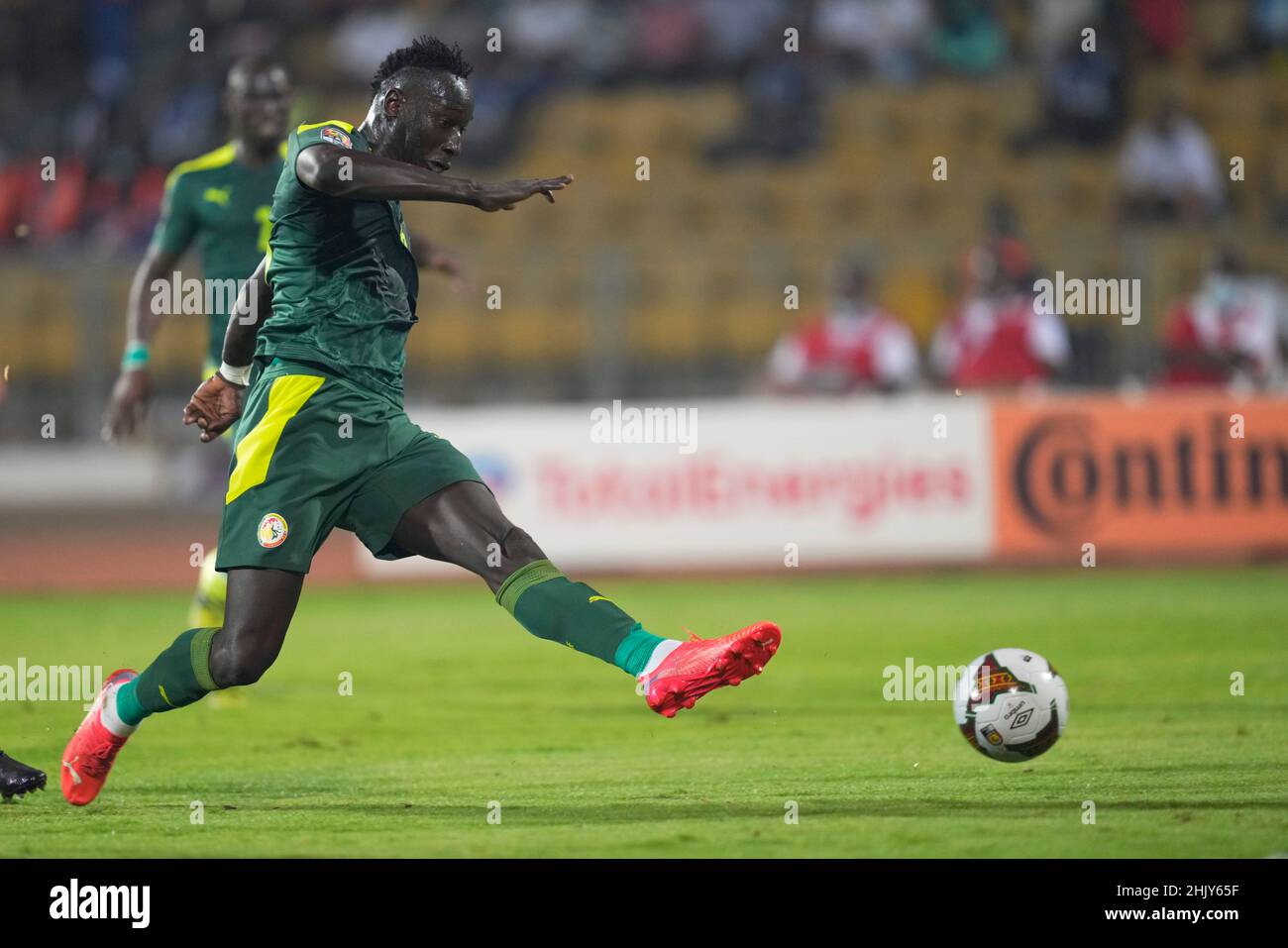 Yaounde, Cameroon, January, 30, 2022: Famara Diédhiou of Senegal scoring their first goal during ...