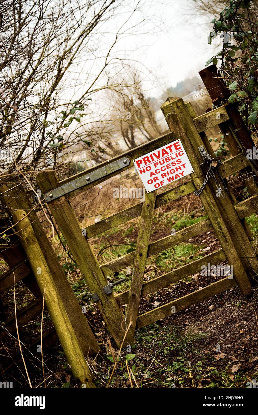 Locked gate leading to private land Stock Photo - Alamy