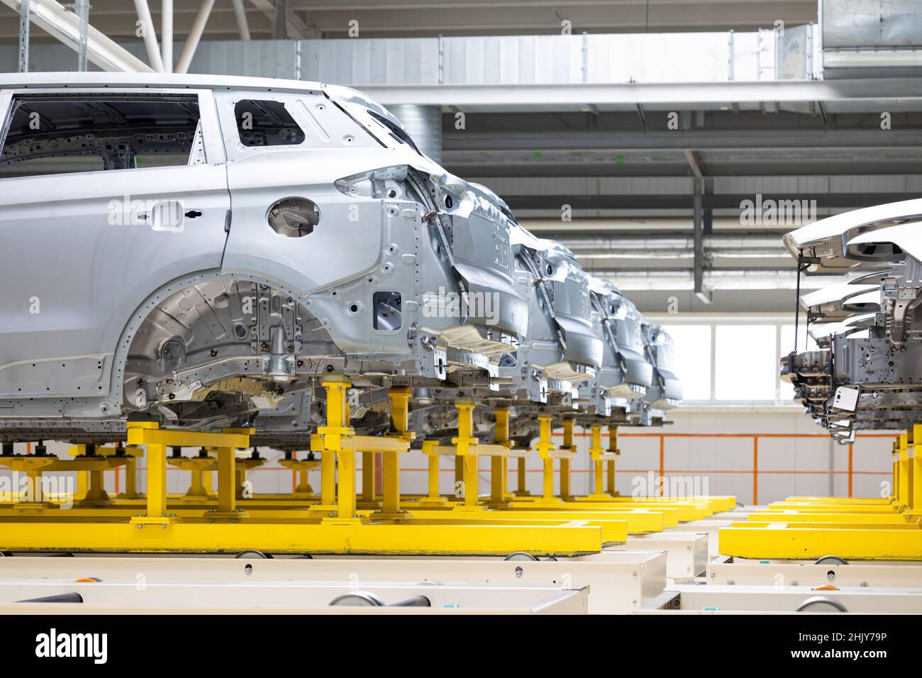 Photo of automobile production line. Welding car body. Modern car ...