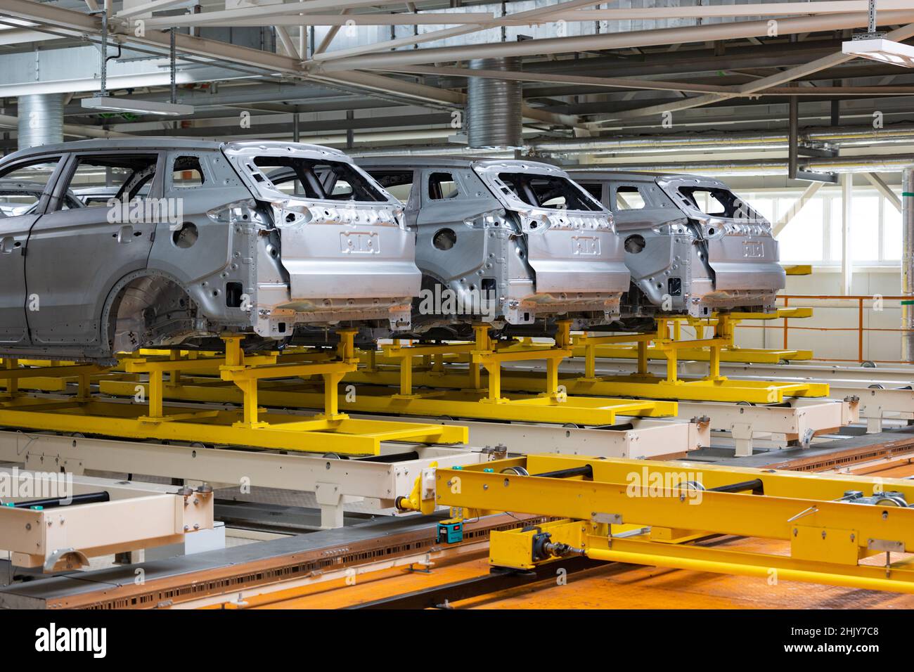Photo of automobile production line. Welding car body. Modern car ...