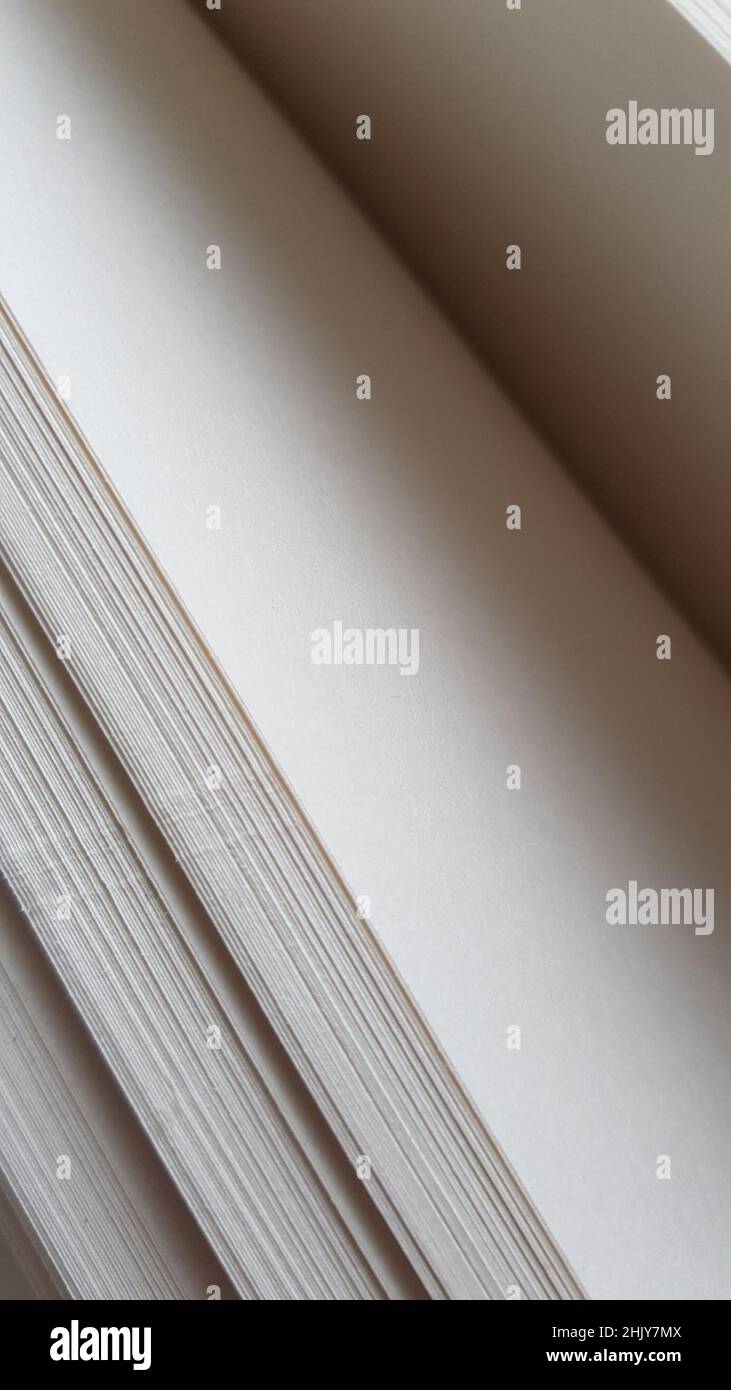 Closeup white blank sheets of thick notepad paper Stock Photo - Alamy