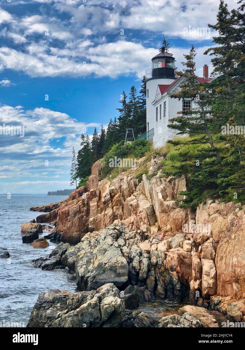 A portrait of the other side of the lighthouse in Portland Head Light ...