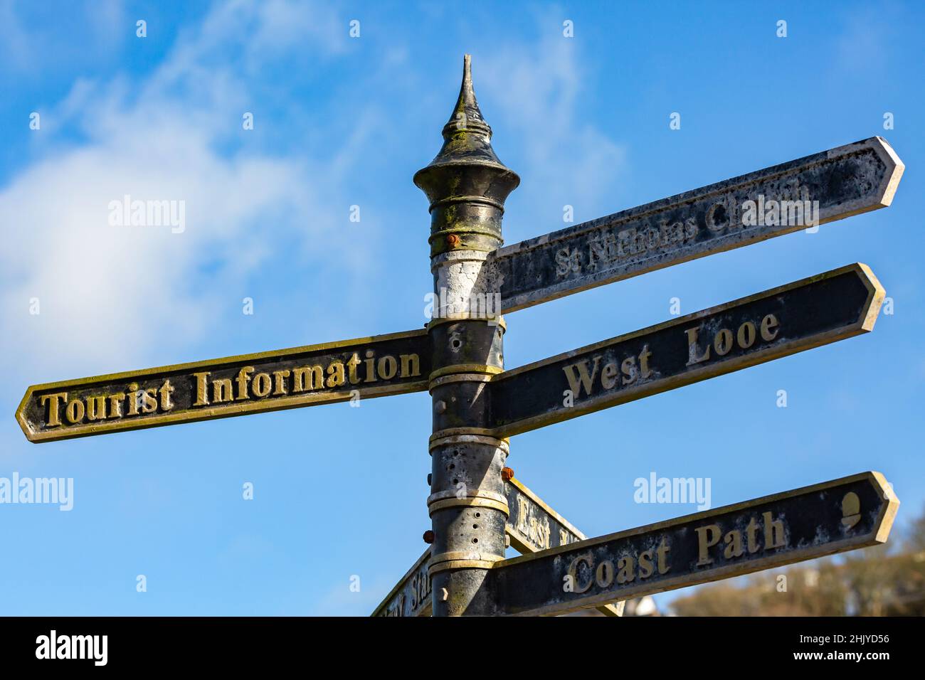 Sunshine over an information sign in Looe, Cornwall, UK Stock Photo - Alamy