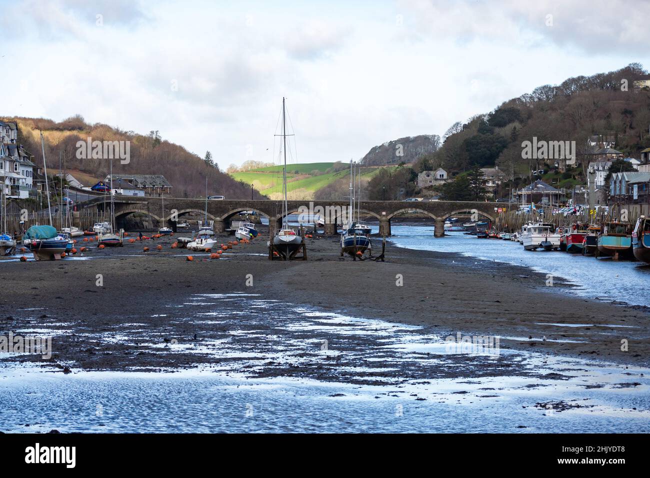 Fishing boat on the river bed at low tide in Looe, Cornwall,uk Stock ...