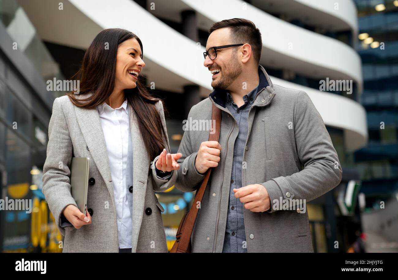 Portraite of handsome man and beautiful woman as business partners ...