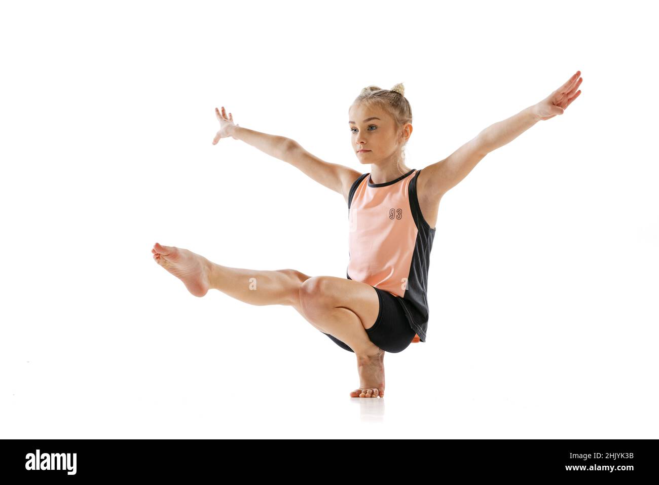 Portrait of little beautiful rhythmic gymnastics artist, kid at sport ...
