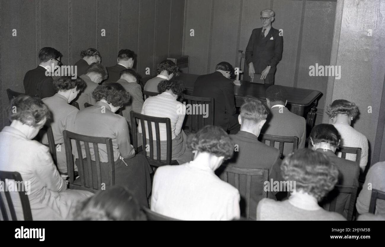 Men praying 1950s hi-res stock photography and images - Alamy