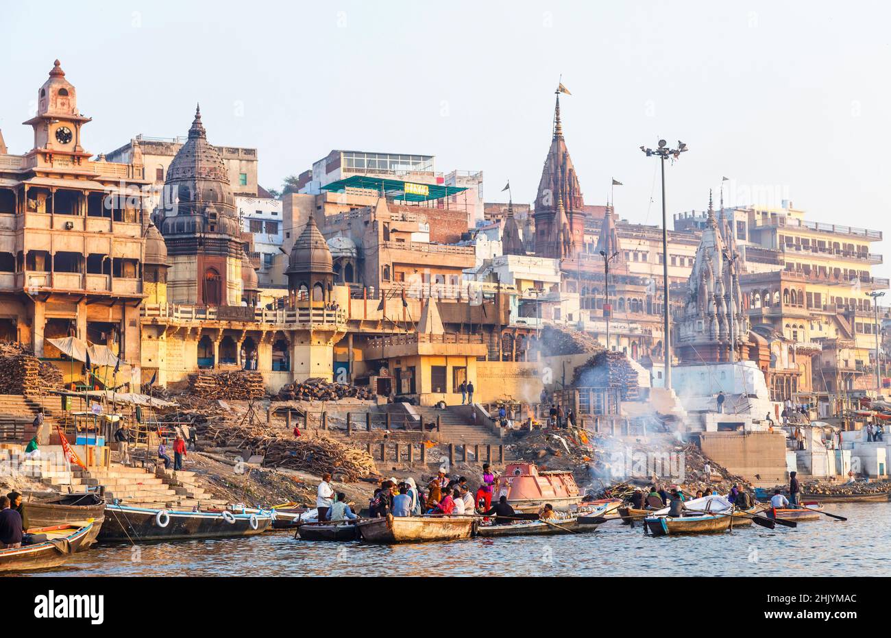 Funeral pyres burning on Manikarnika Ghat at Varanasi (formerly Banaras ...