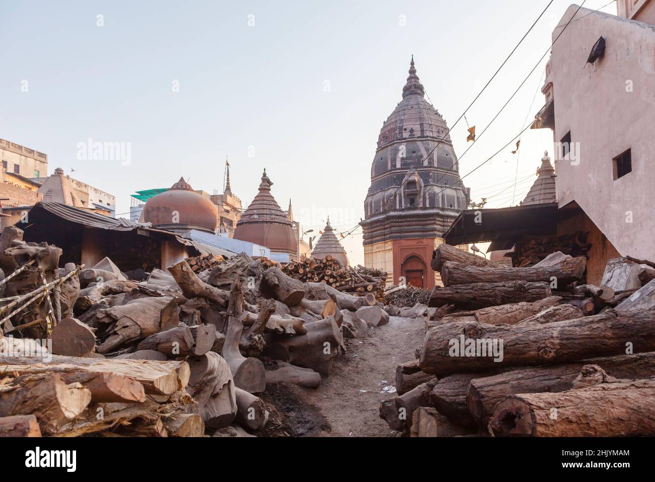 Wood stacked for funeral pyres on Manikarnika Ghat at Varanasi ...