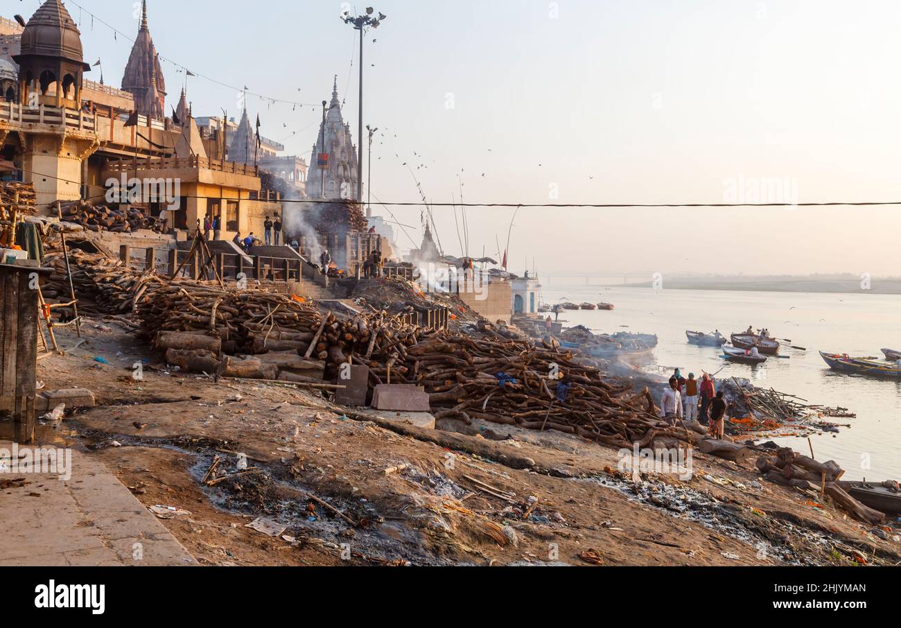 Funeral pyres burning on Manikarnika Ghat at Varanasi (formerly Banaras ...
