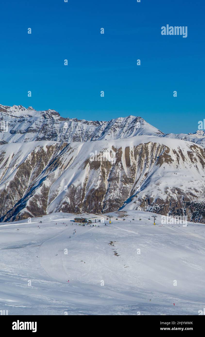 Vertical shot of Alps in Italy covered in snow Stock Photo - Alamy