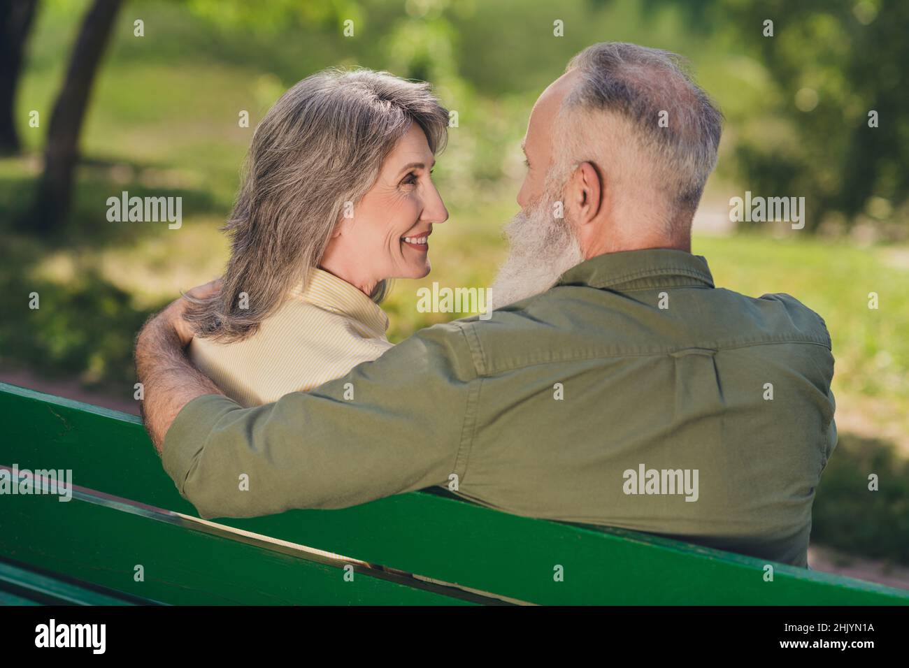 Photo of happy positive old happy pensioner woman man sit bench hug ...