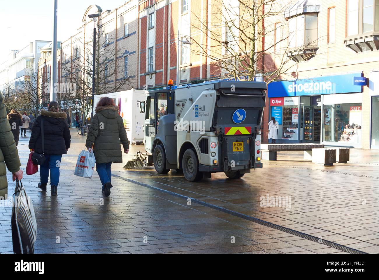 Road sweeper vehicle in a city street Stock Photo - Alamy