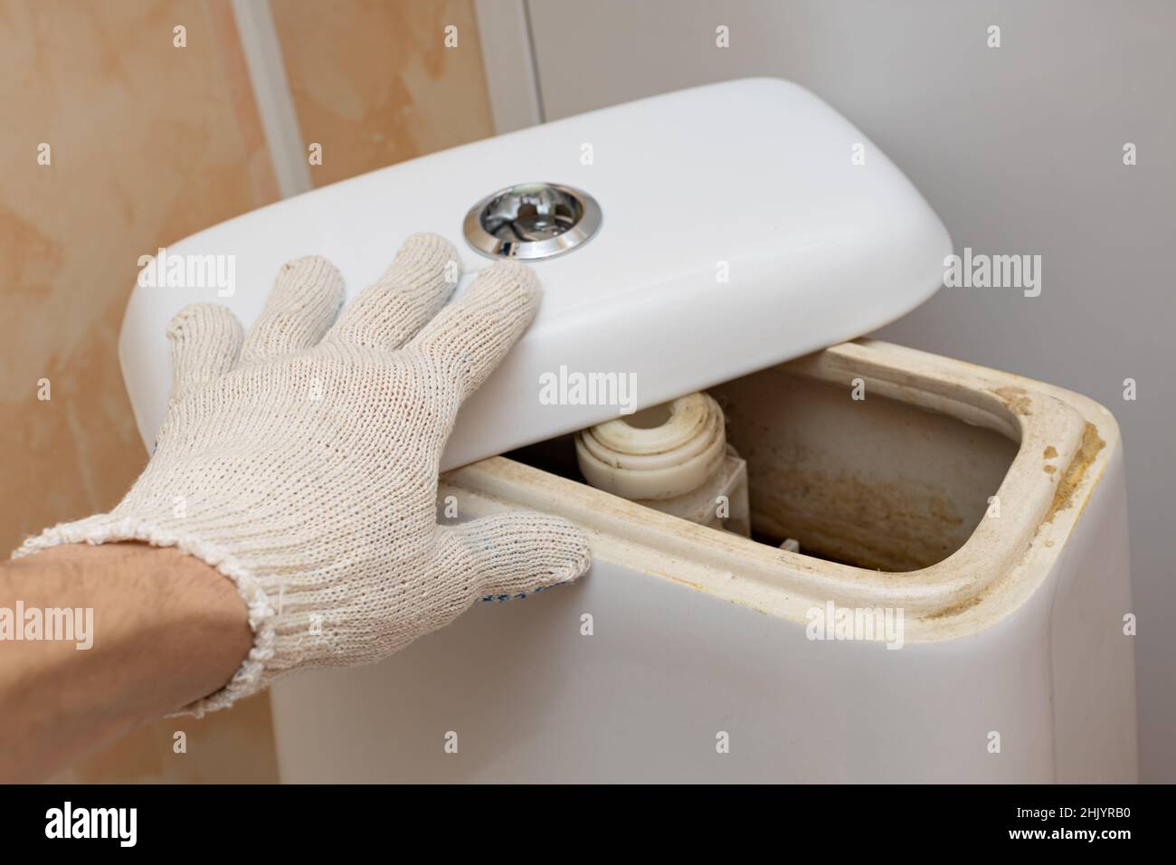 Toilet flush tank hi-res stock photography and images - Alamy