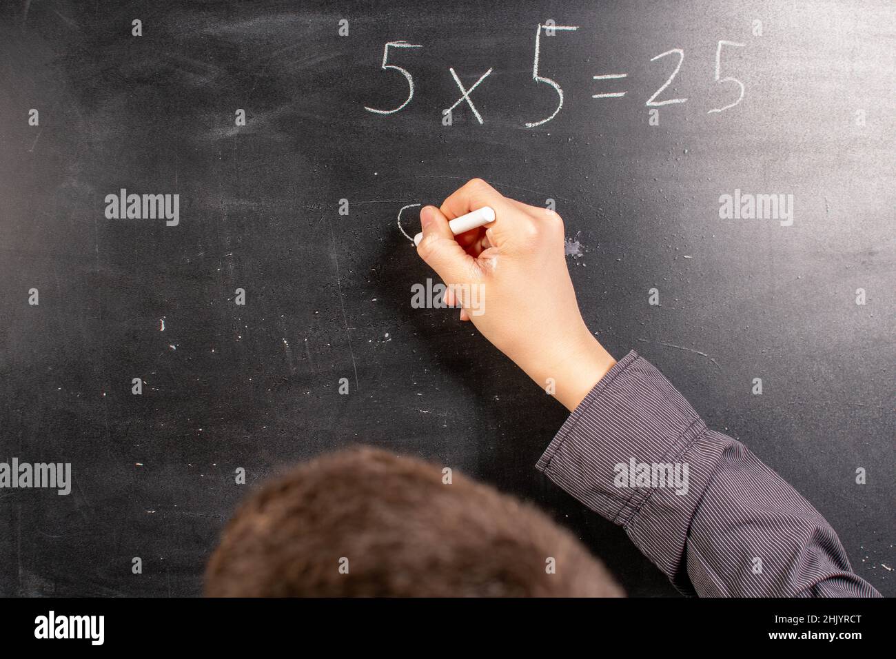 Boy lecturing mathematics at a blackboard Stock Photo - Alamy