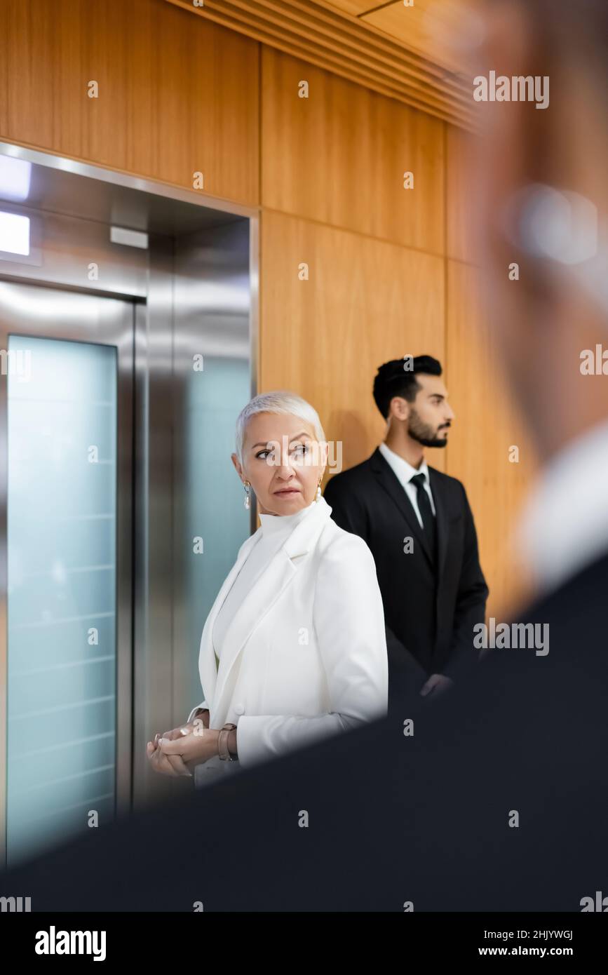 Bodyguards elevator hi-res stock photography and images - Alamy
