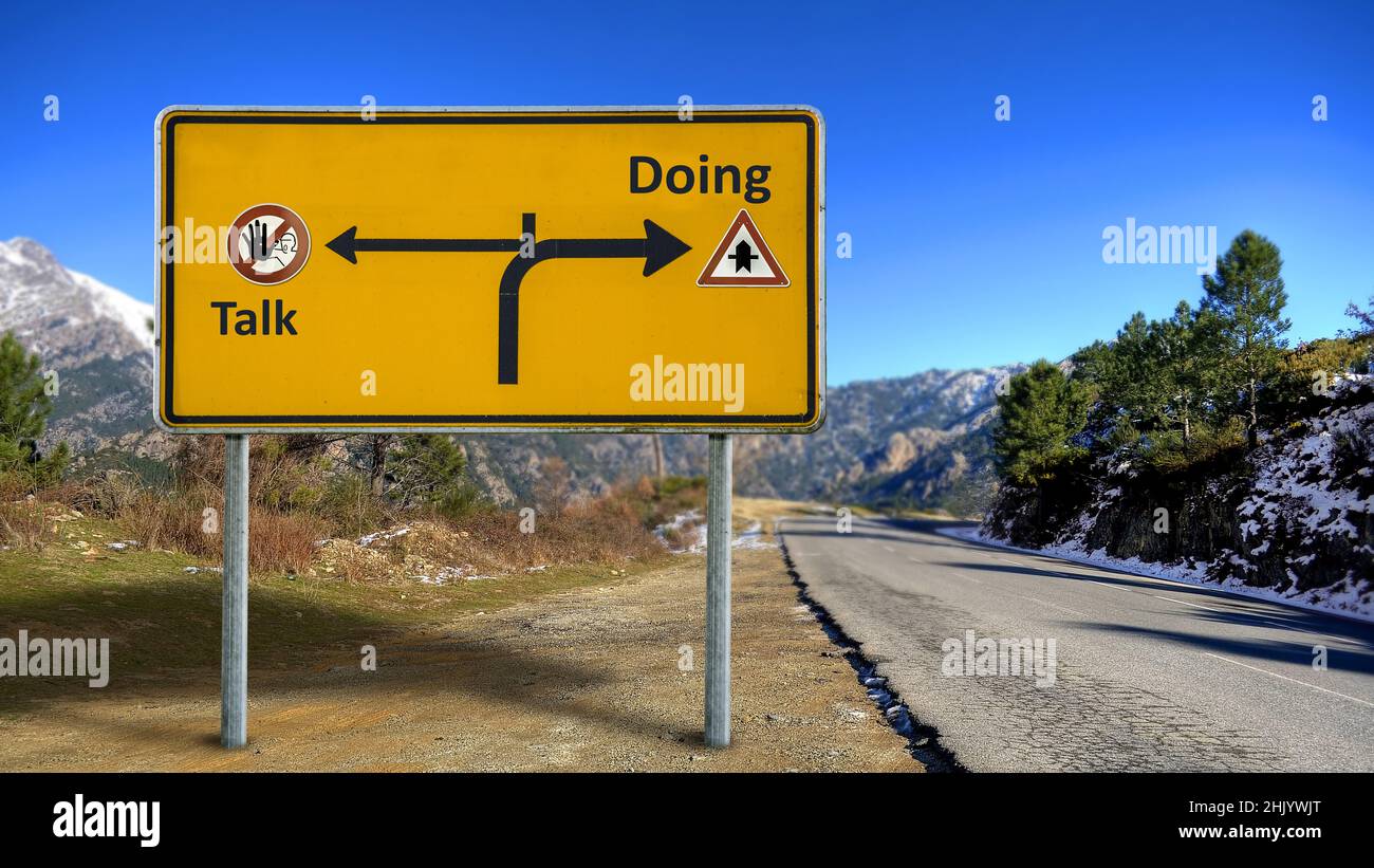 Street Sign the Direction Way to Doing versus Talk Stock Photo - Alamy