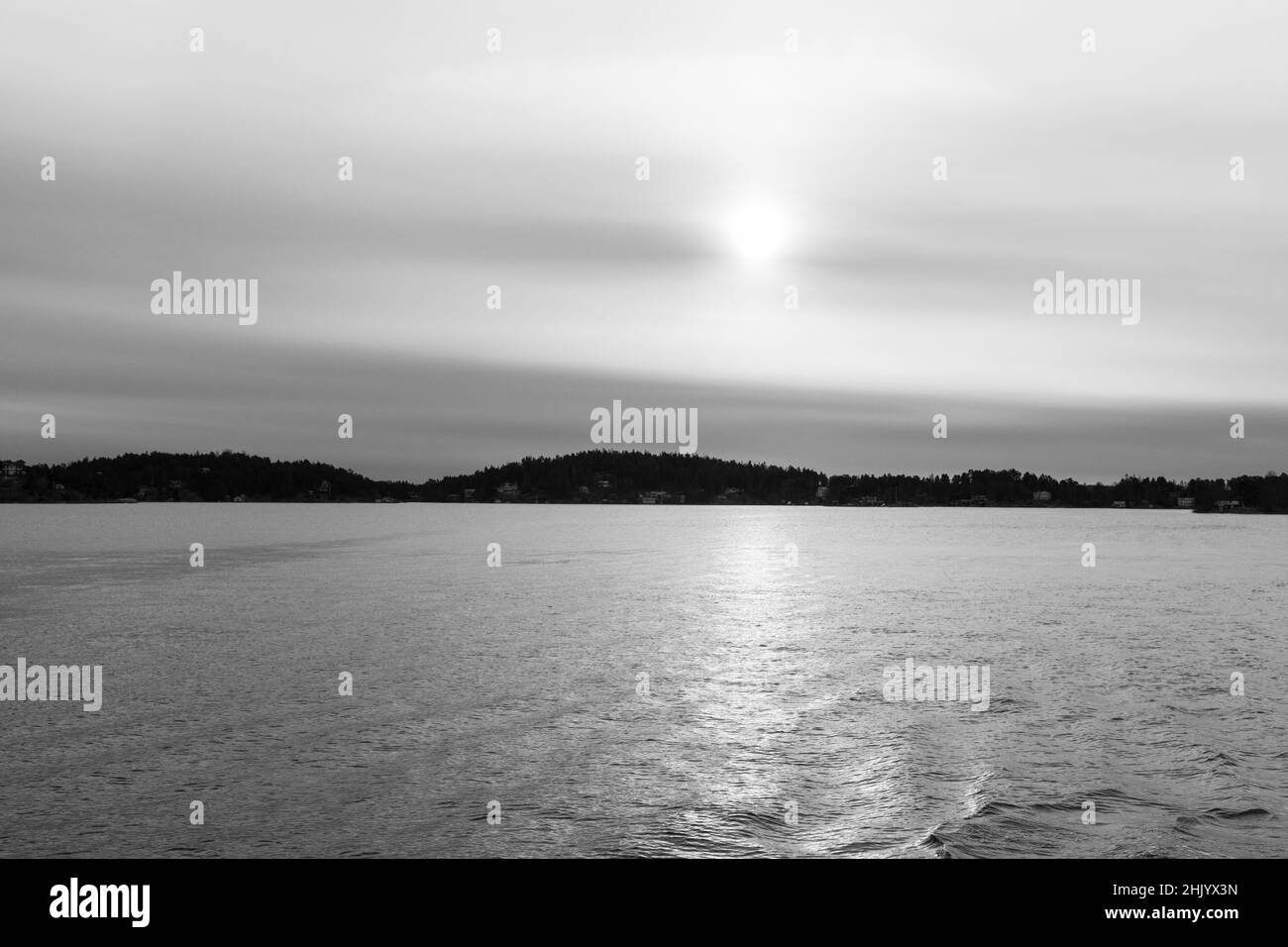 Tranquil sunset over ocean Black and White Stock Photos & Images - Alamy