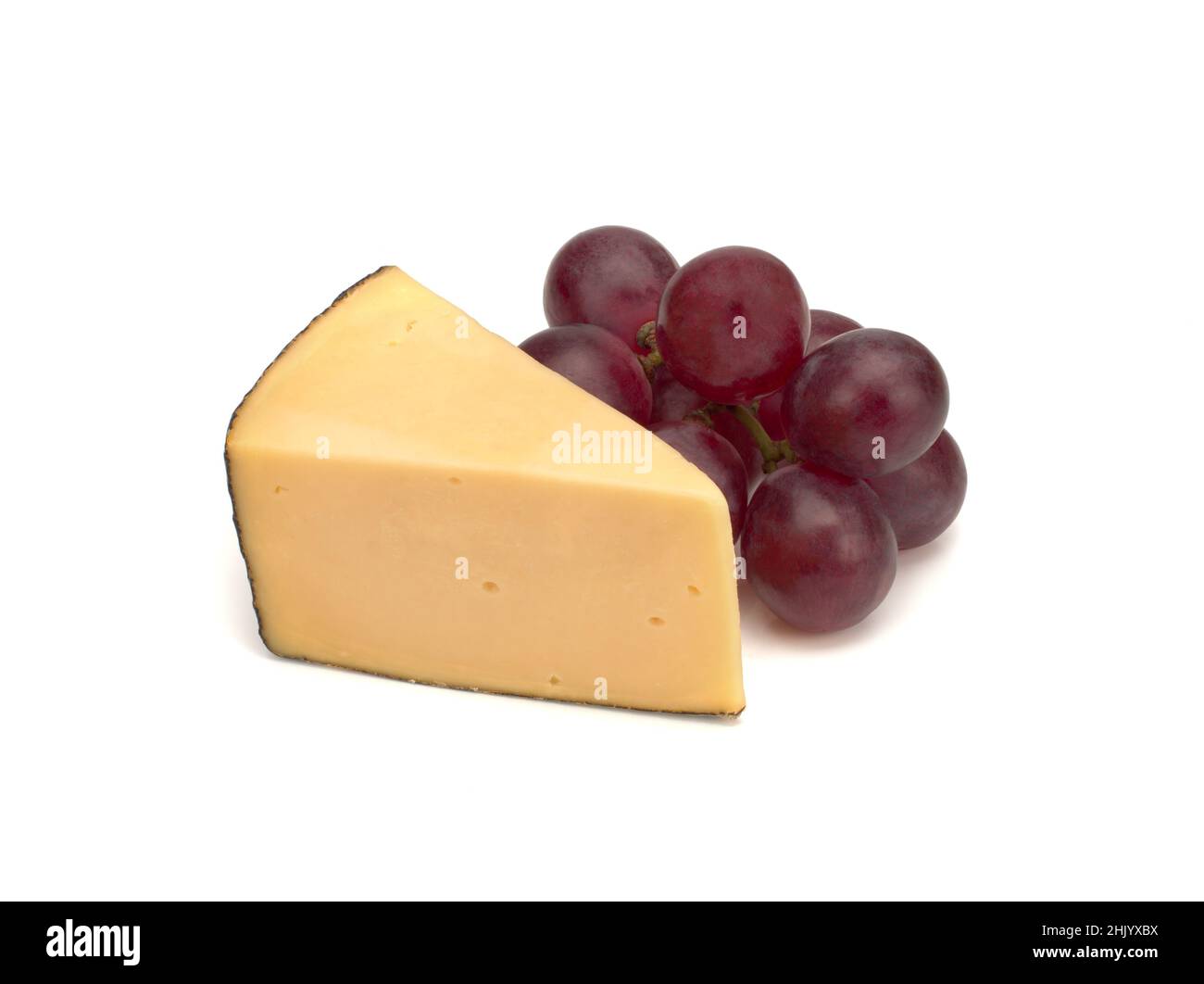 Piece of cheese and grapes isolated on white background Stock Photo - Alamy