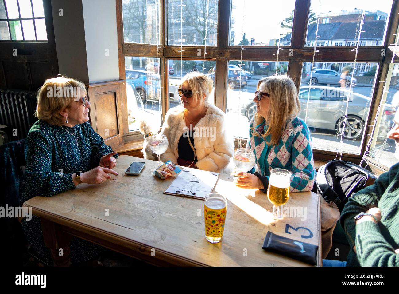 three middle aged women in the pub Stock Photo - Alamy