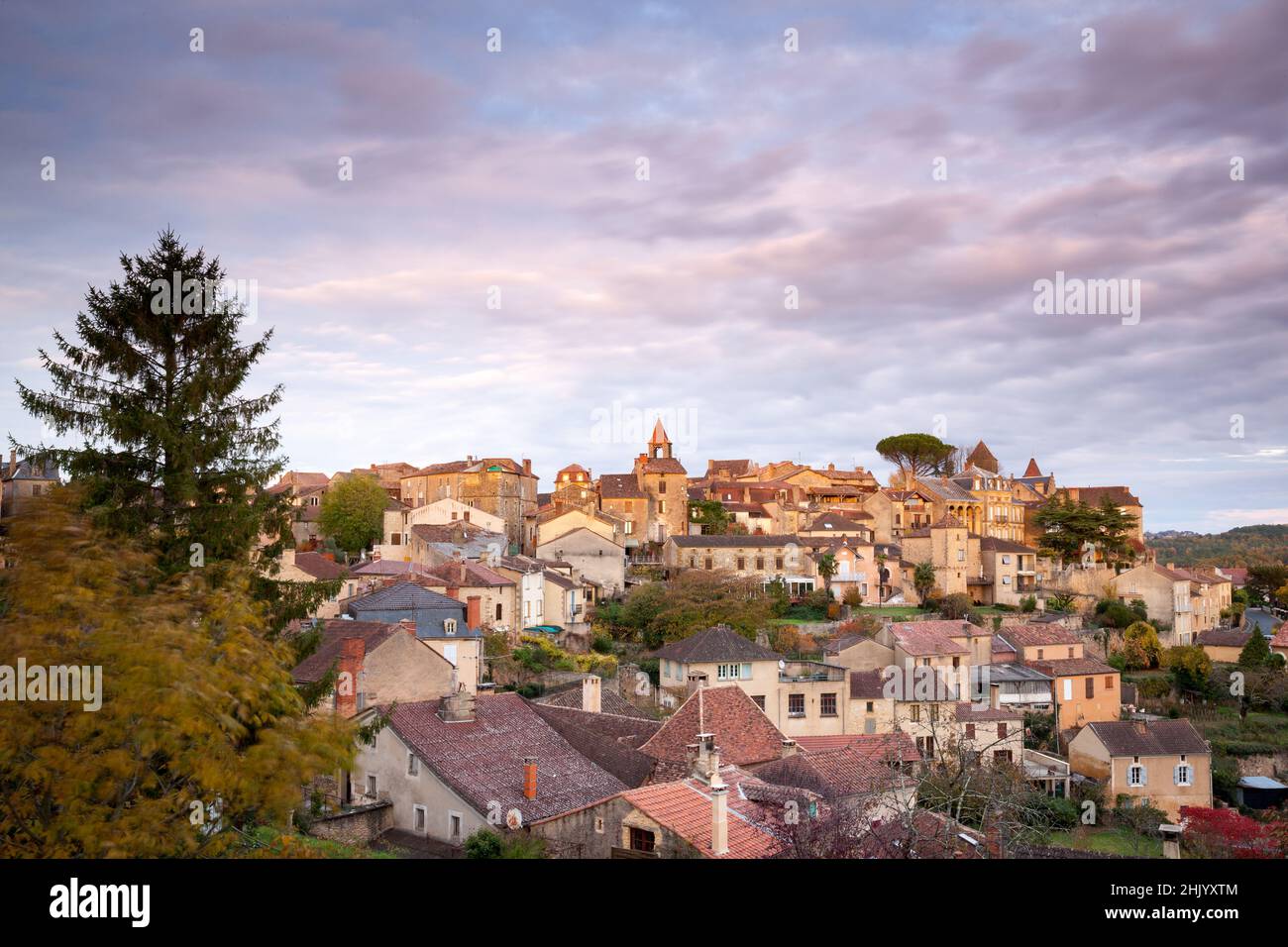 Belves view at sunset with famous church tower medieval buildings and ...