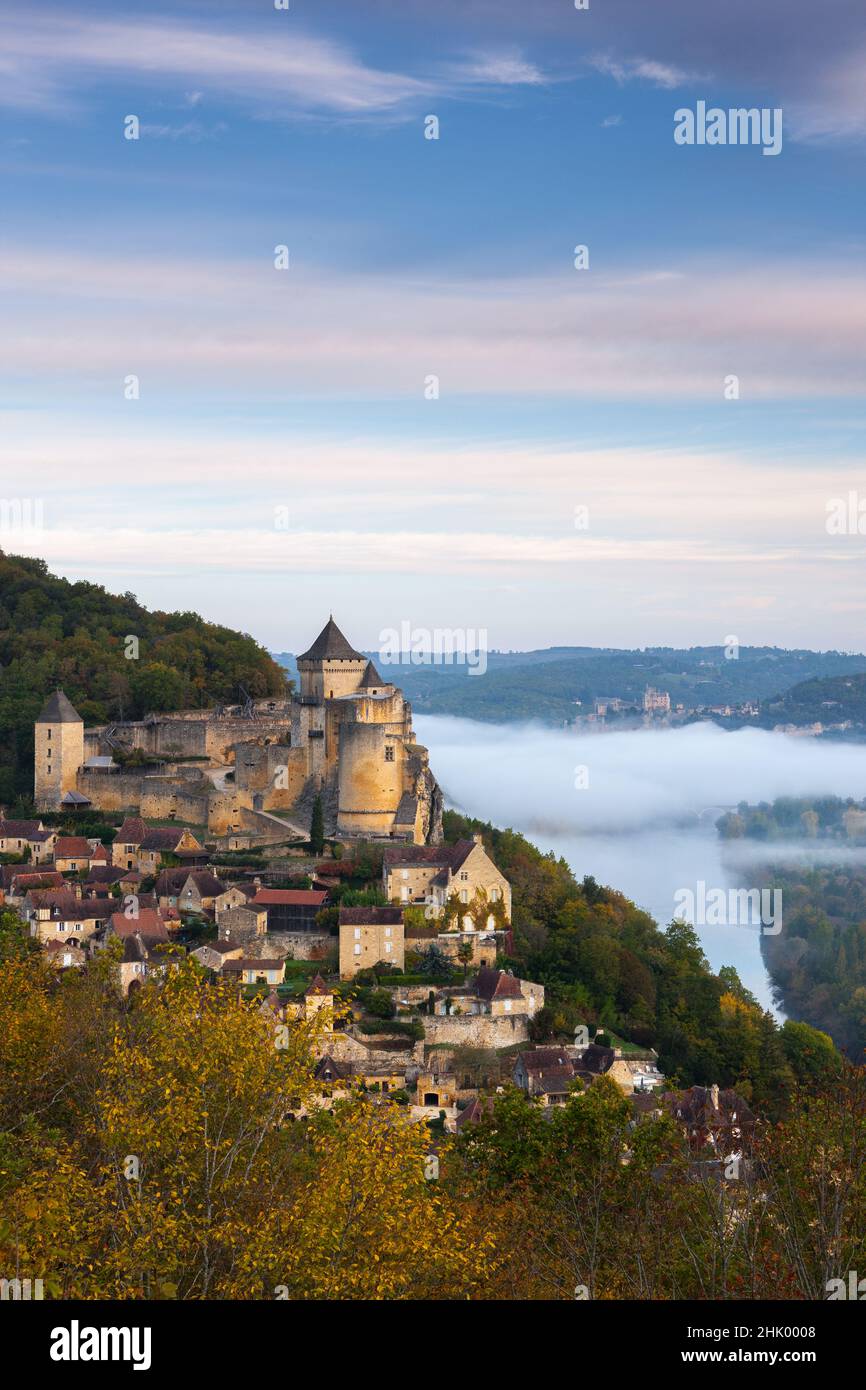 Chateau Castelnaud in the mist at sunrise Dordogne France Stock Photo ...