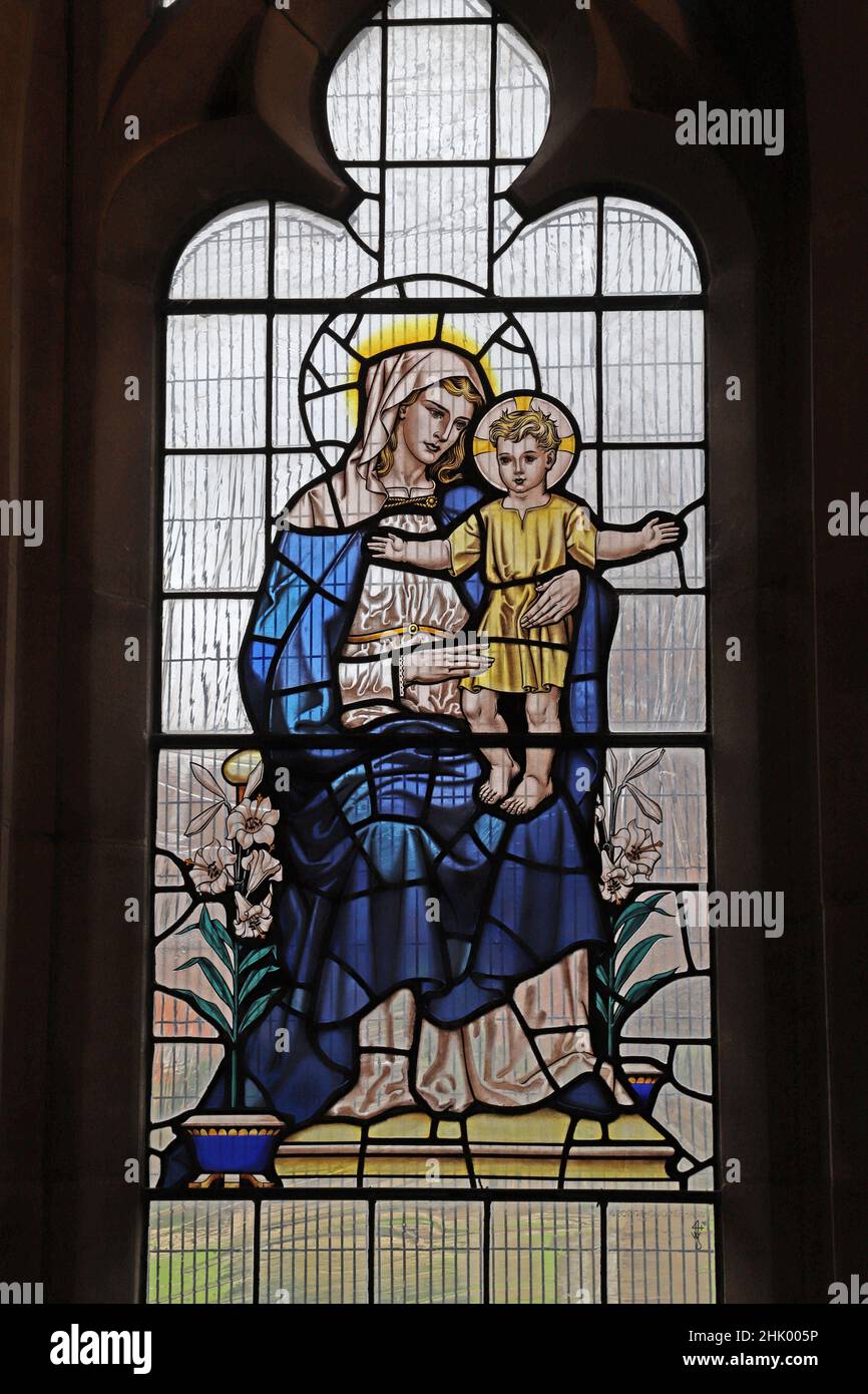 A stained glass window made by Wippell & Co. designed by George Cooper ...