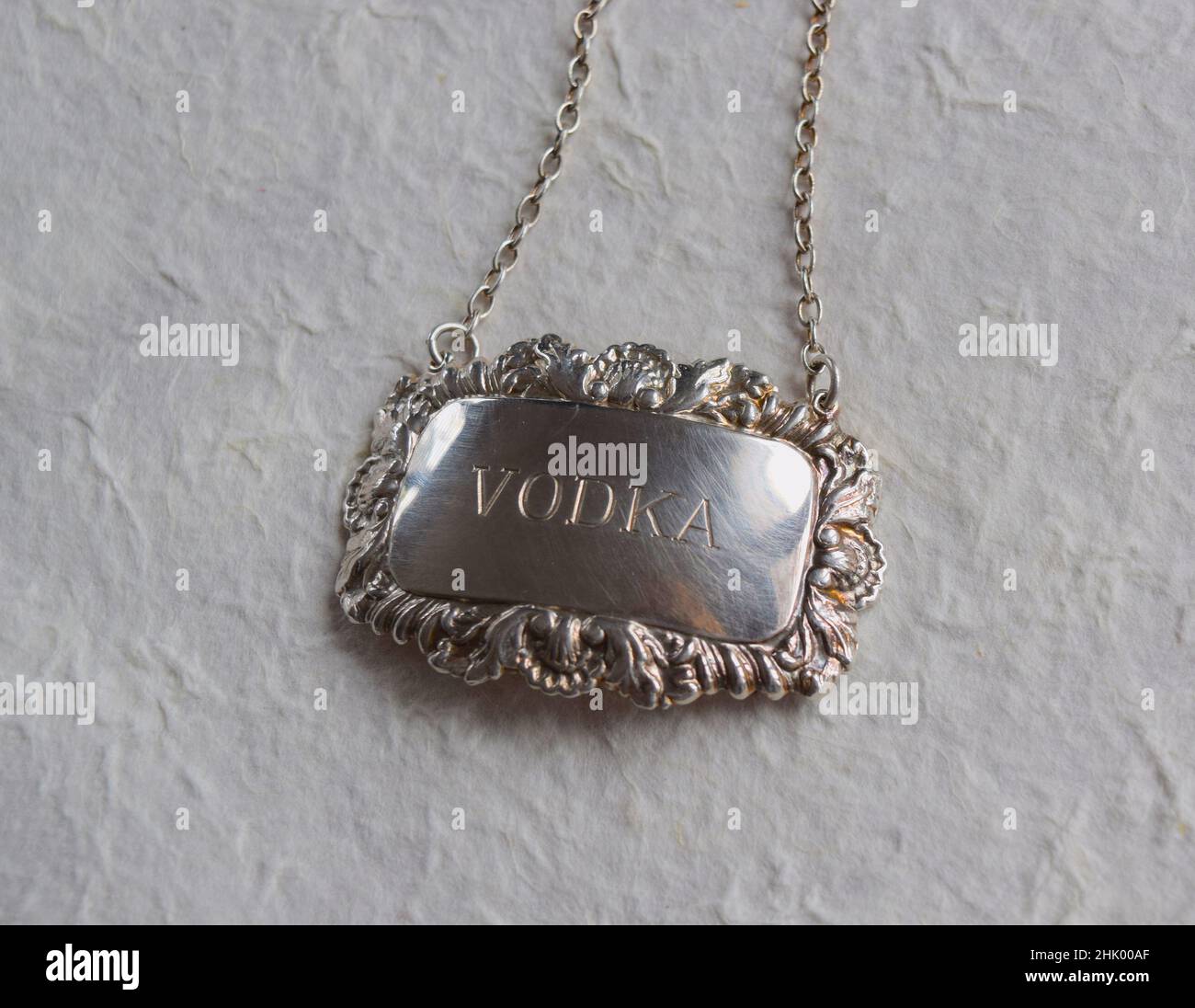 Vintage silver plated decanter label Vodka Stock Photo - Alamy