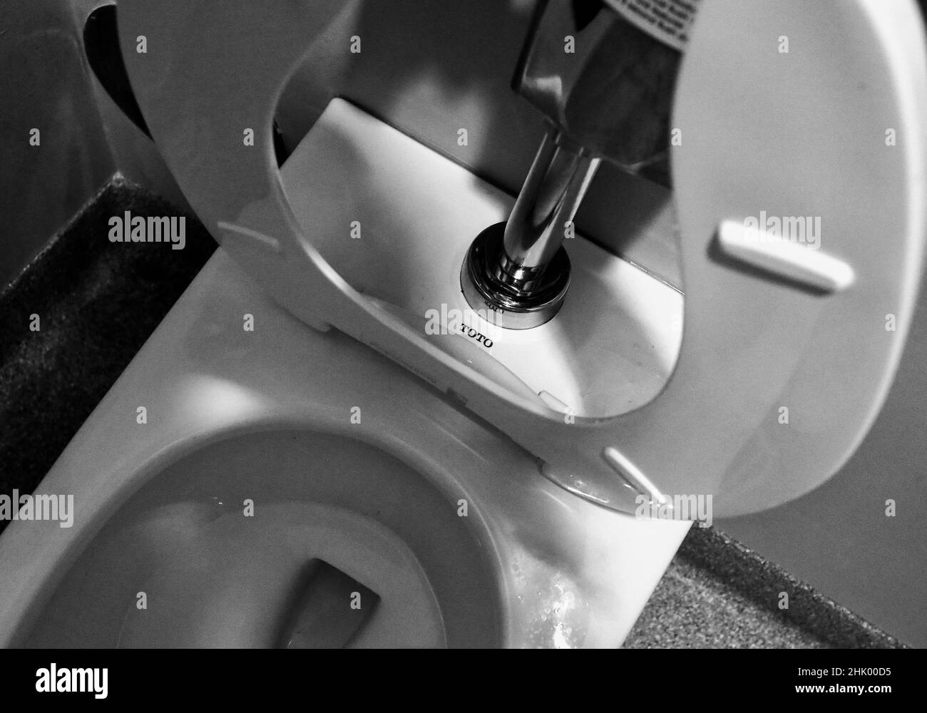 Flushing toilet hi-res stock photography and images - Alamy