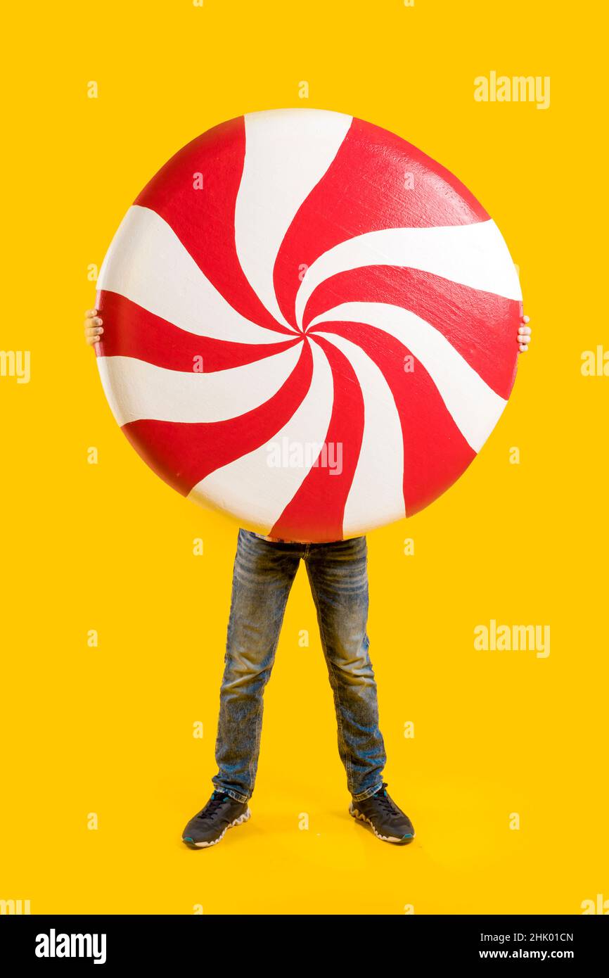 Confectionery. A guy with a funny face. Delicious dessert. Cute boy ...