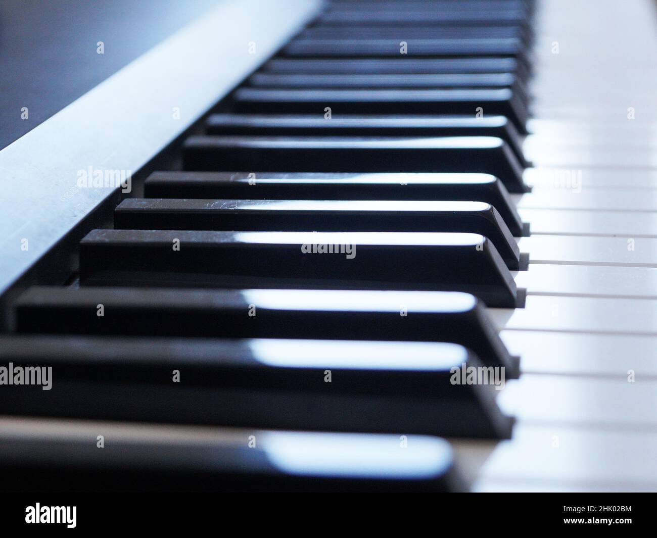 blurred electronic piano keyboard, perspective view for music ...