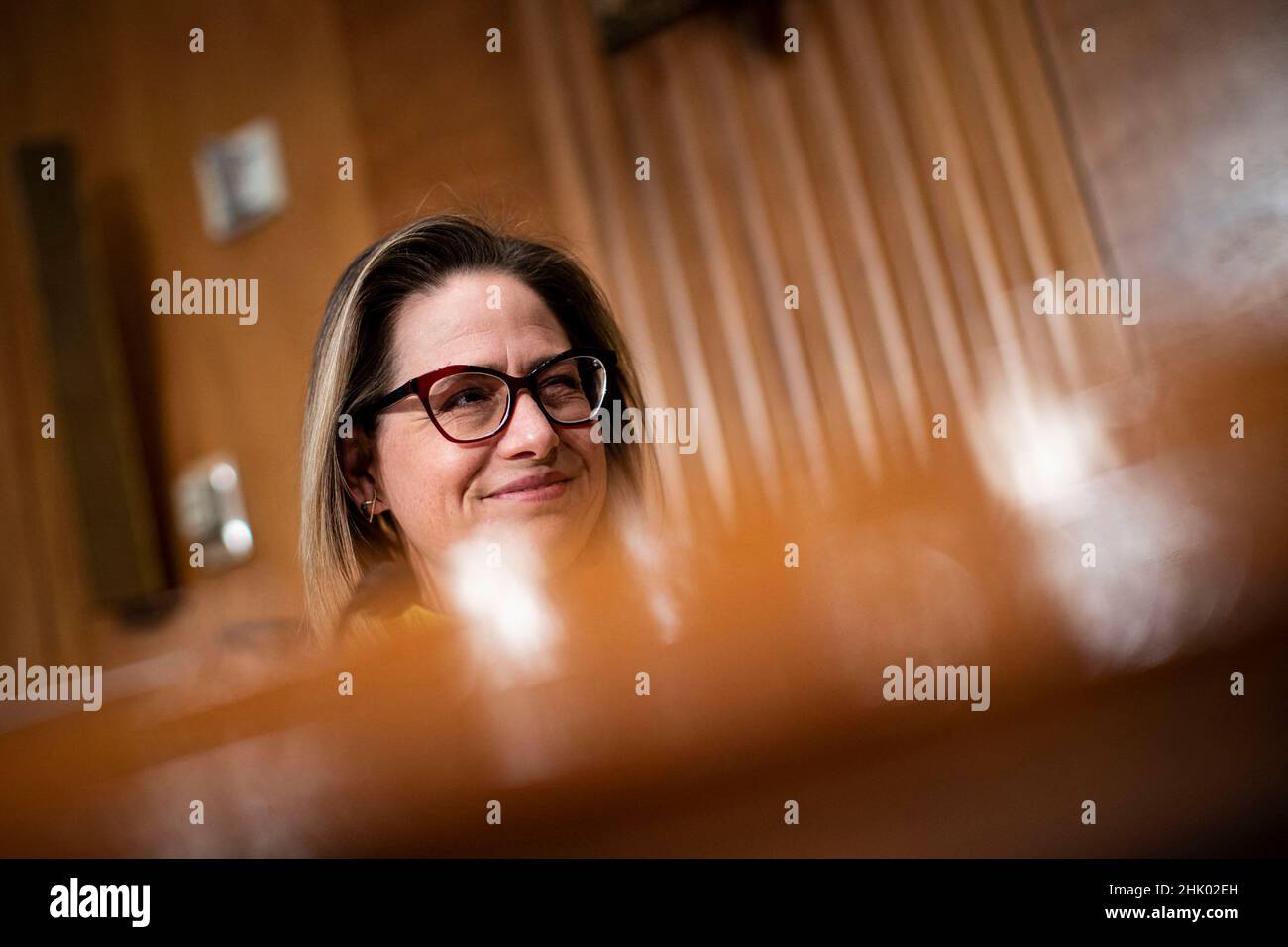 Senator Kyrsten Sinema, a Democrat from Arizona, listens during a ...