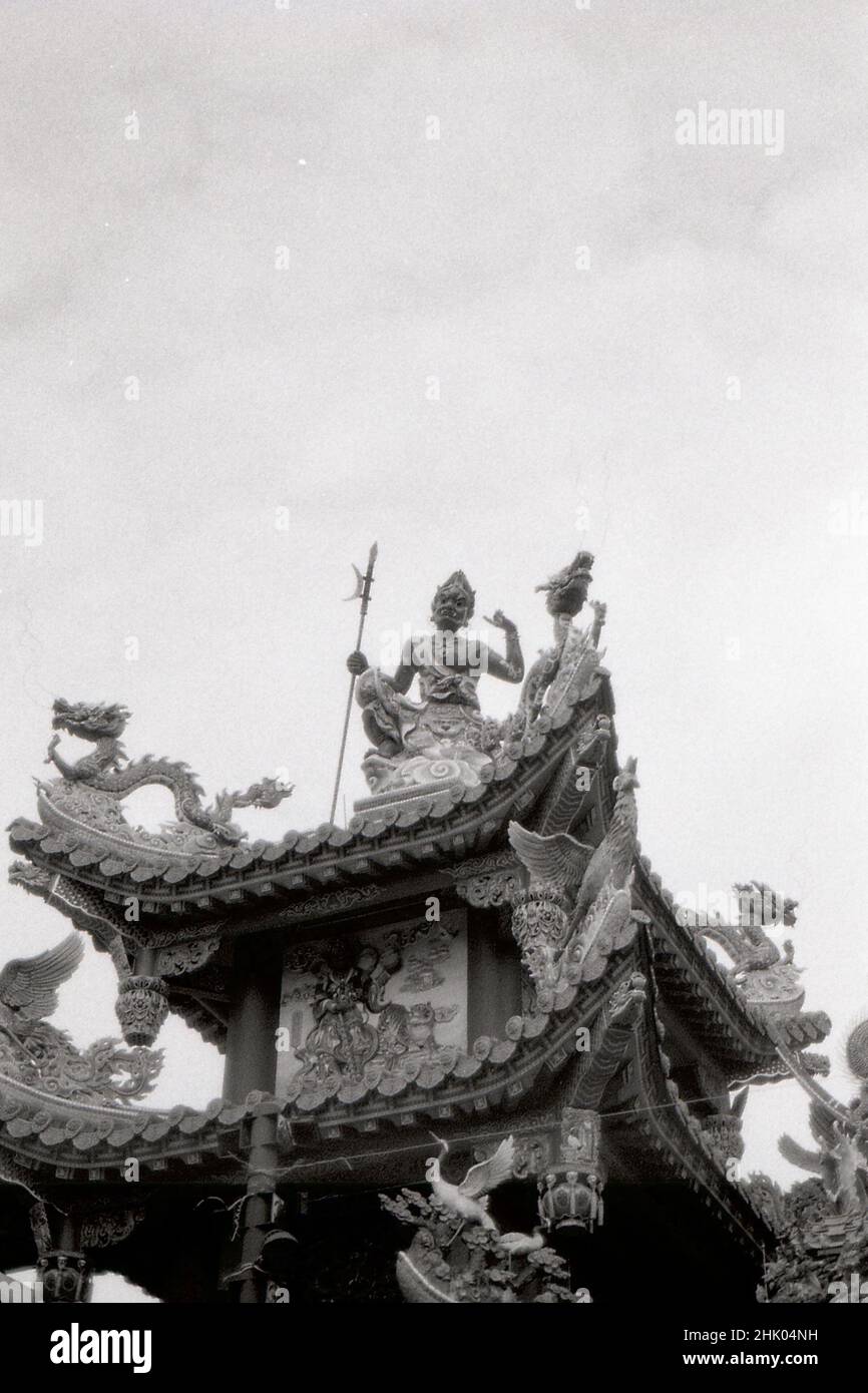 Vertical grayscale shot of a Chinese rooftop Stock Photo - Alamy