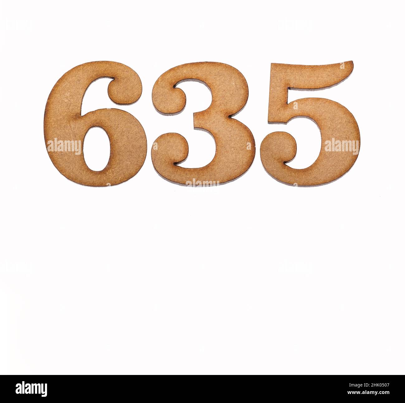 Number 635 in wood, isolated on white background Stock Photo - Alamy